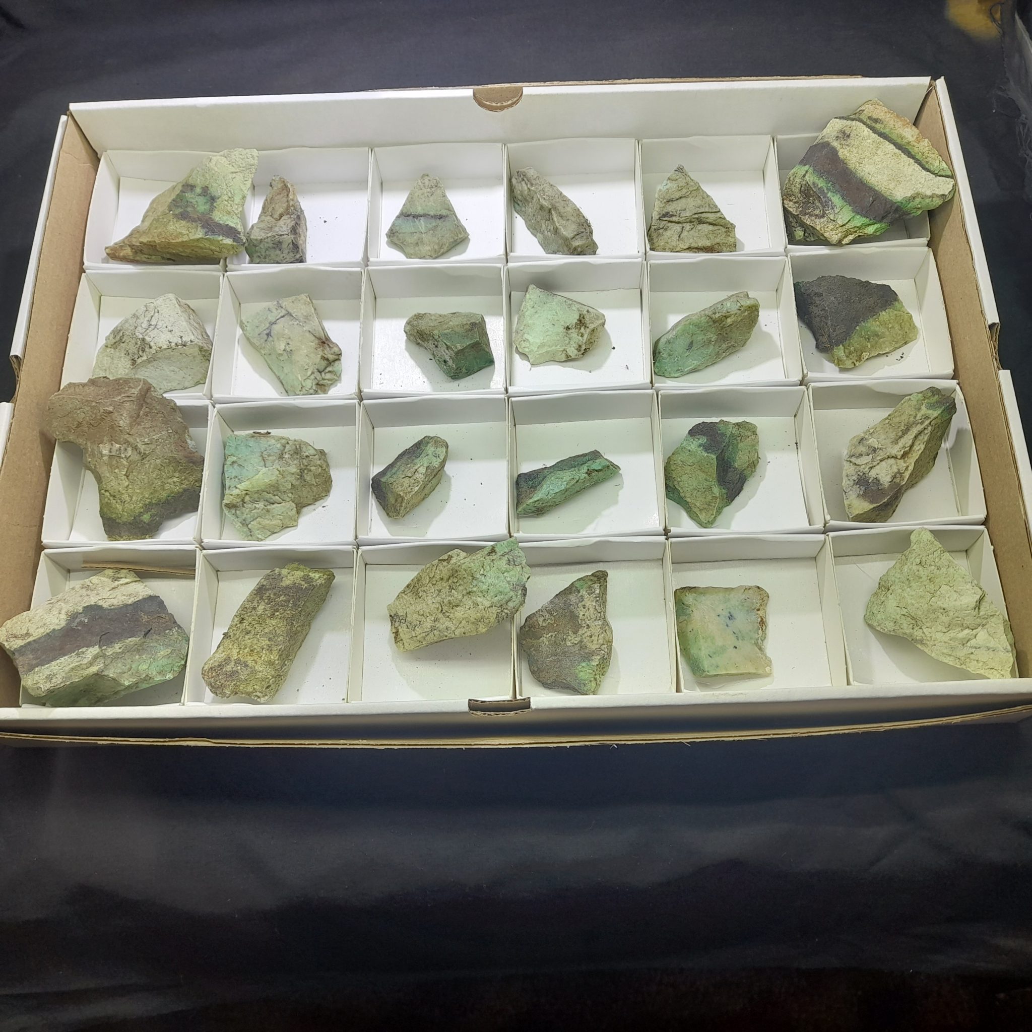 (WM03734) One Box Of 24 Transvaal Jade Mineral Specimens – AMAZONITE